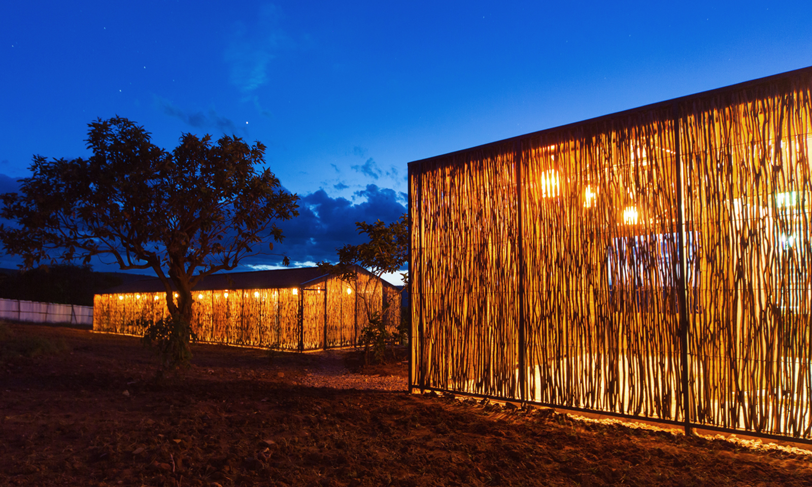 PIH Hospital Dormitory in Rwanda - Exterior Night 3 — Sharon Davis Design